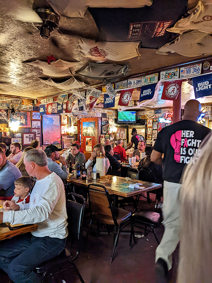 Full house, full hearts: On game days, Dreamland transforms into a crimson-tinged celebration where strangers become friends over shared sauce and stories.