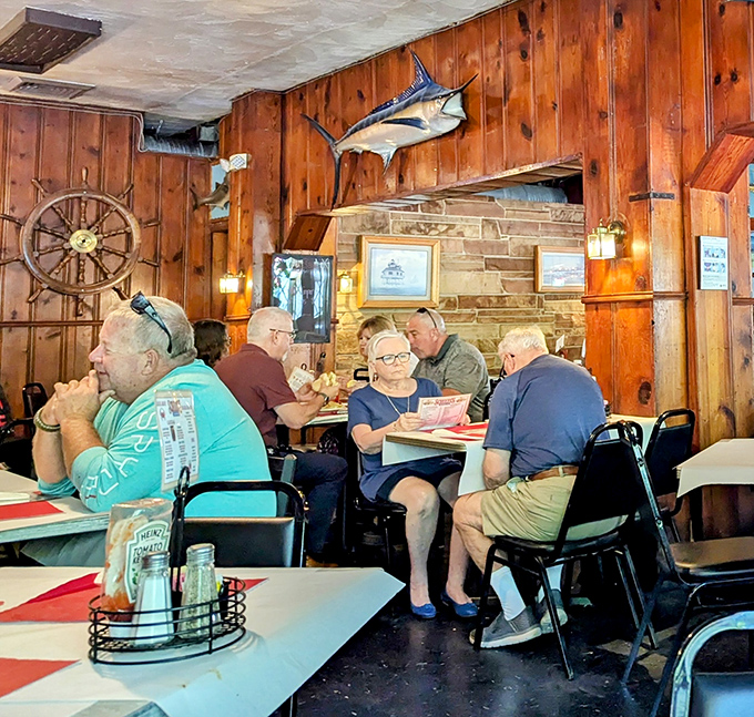 Regulars gather like members of a delicious secret society, trading crab-picking techniques and stories that grow taller with each visit.