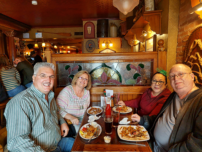 Happy diners enjoying their meals together, which is really what great restaurants are about—bringing people together over exceptional food.