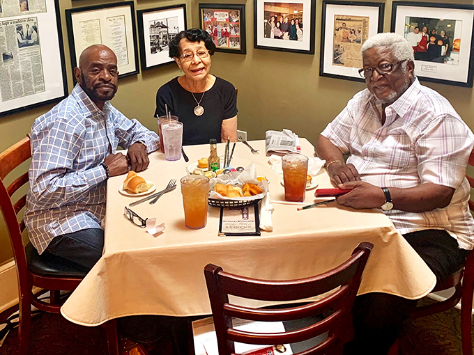 Generations gather around these tables, proving that good food creates connections stronger than any social media platform ever could.