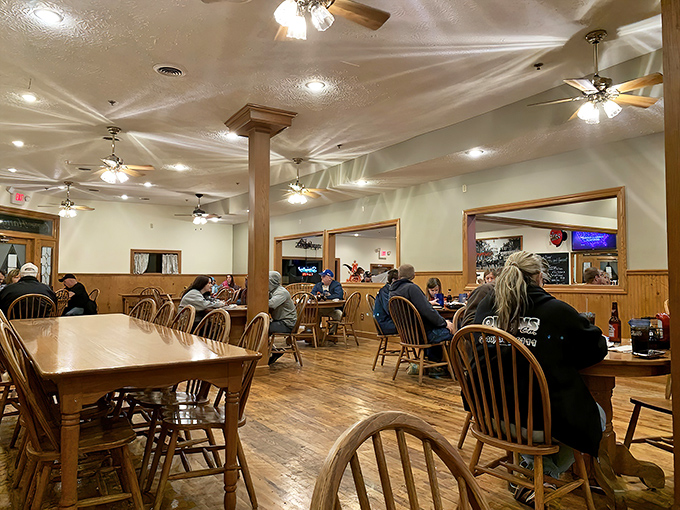A bustling dining room where strangers become temporary neighbors, united by the universal language of "mmm" and "pass the ketchup, please."