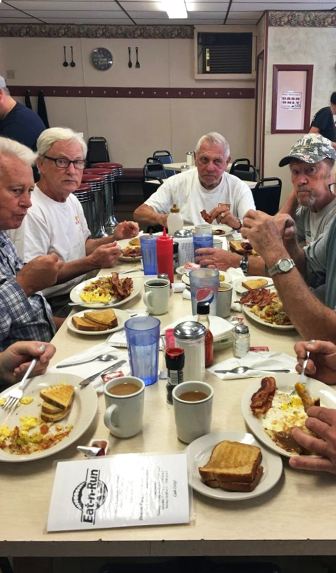 The true measure of any diner is its regulars – these gentlemen have clearly solved the equation for the perfect breakfast ritual.