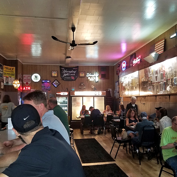 Where strangers become temporary friends united by the universal language of "you've got to try this."