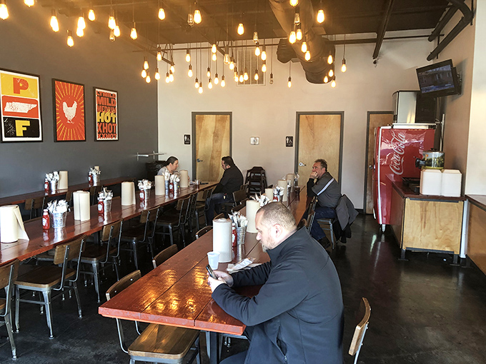Lunchtime warriors hunker down at wooden tables, preparing for battle with Nashville's most notorious culinary challenge.