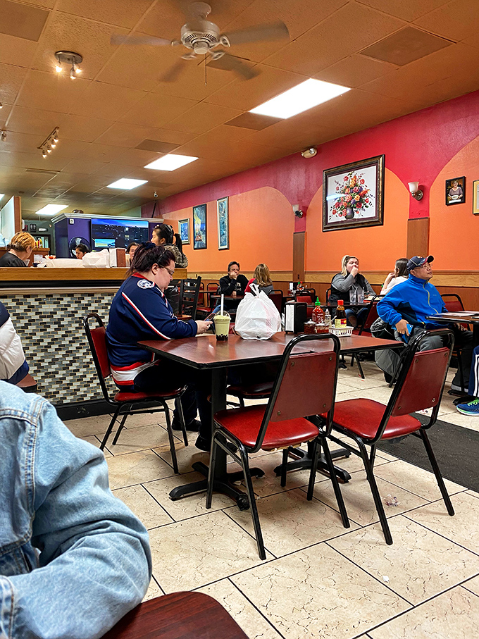 Mi Li's interior might be no-frills, but those colorful walls create a cheerful backdrop for serious eating. Function meets just enough form.