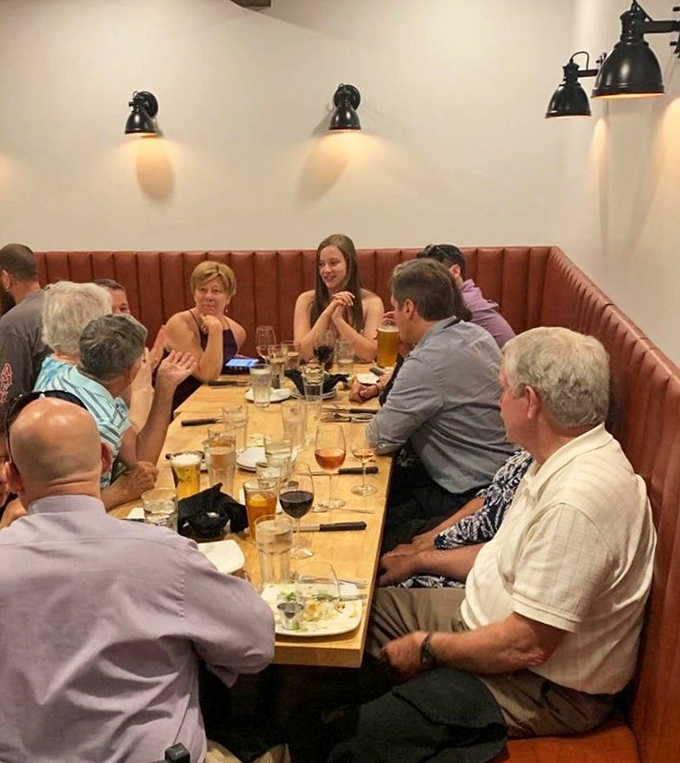 Orange leather banquettes and happy diners &ndash; proof that good food creates its own atmosphere.