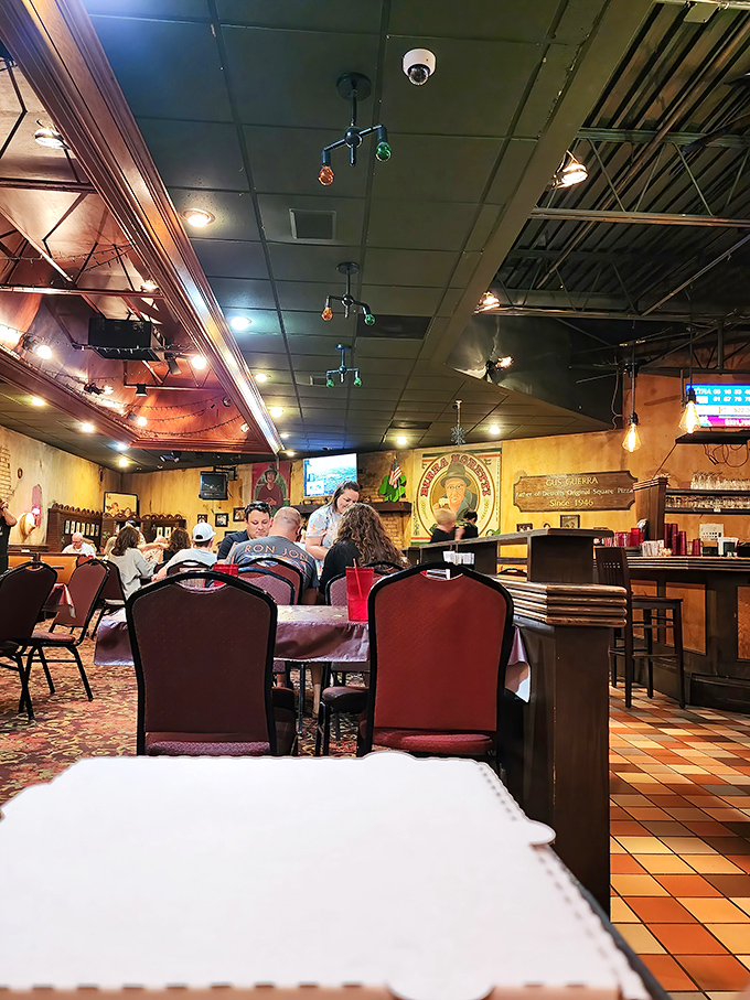 Where locals gather to debate Lions' prospects while united in their devotion to Detroit's square pizza perfection.