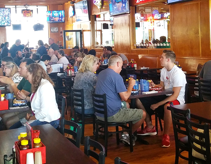 Conversations flow as freely as the barbecue sauce at tables filled with locals who know the secret to happiness involves smoked meat.