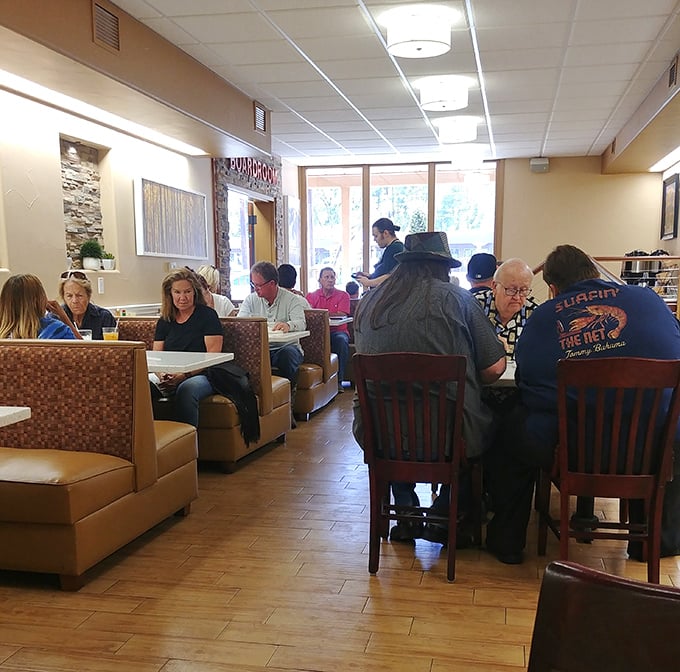The dining room hums with conversation and the clinking of forks against plates. Notice how nobody's looking at their phones?