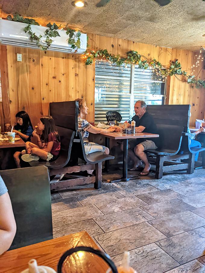 Families gather in booths beneath twinkling lights and ivy&mdash;creating memories over meals that will have them plotting return trips before dessert arrives.