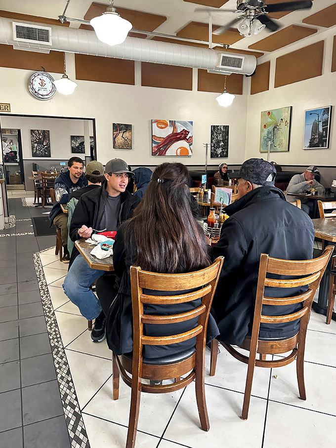 The dining area buzzes with locals who know the secret: great food tastes even better with great company.