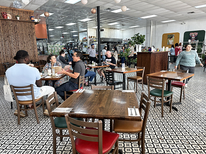 Weekend warriors gather at wooden tables, united in the universal language of "this is worth the wait" and "yes, I'm definitely coming back."