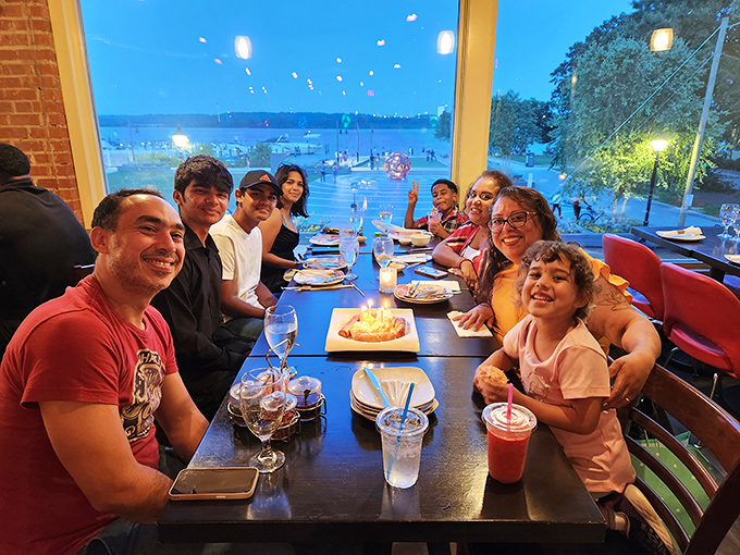 Good food brings good people together. This table knows the secret to happiness: shared plates and Thai food with a view.