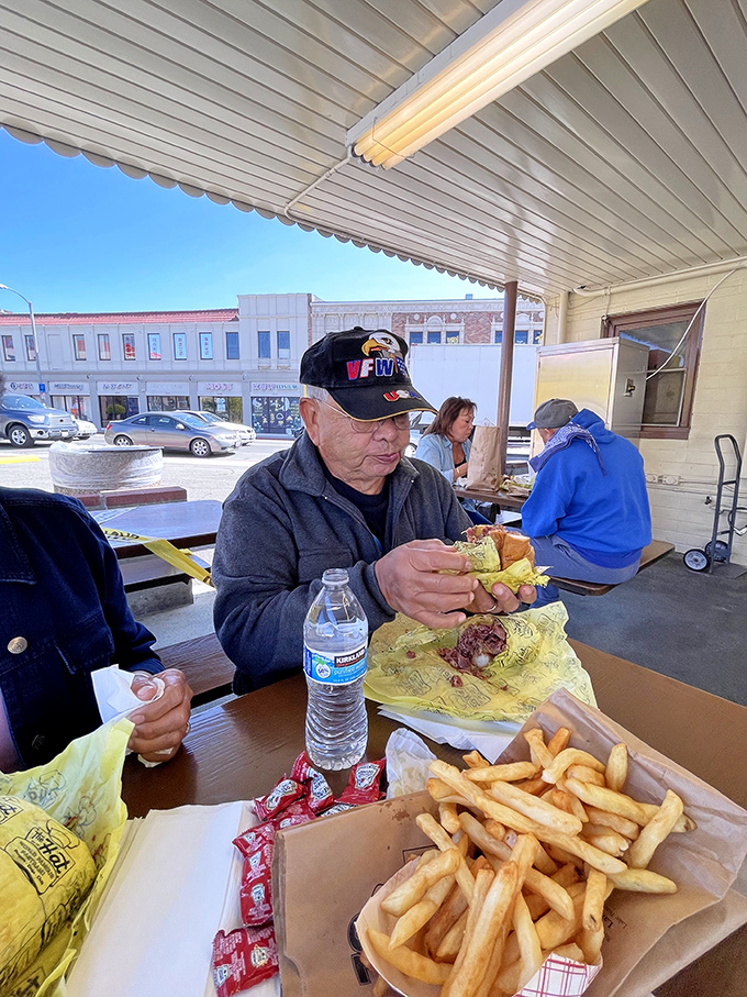 The universal language of sandwich appreciation knows no age limit. This is what contentment looks like.