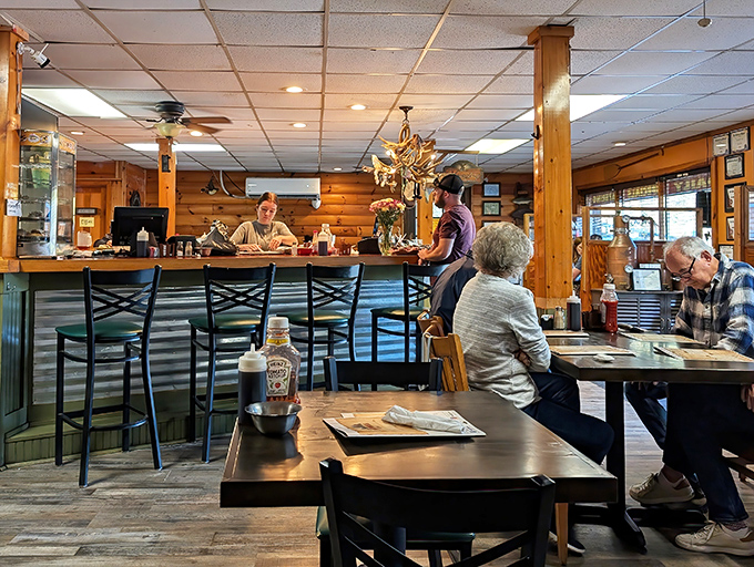 Morning light streams in as diners settle into that perfect rhythm of conversation, coffee sips, and contemplating second helpings.