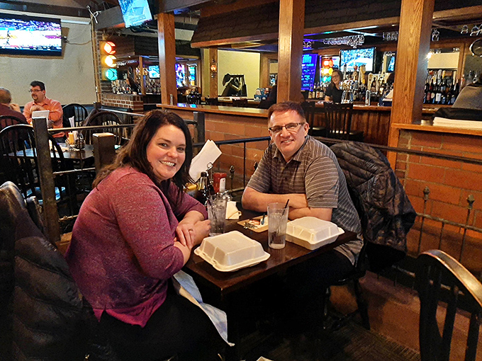 Happy diners proving that good food is the universal language of contentment and possibly mild food comas.