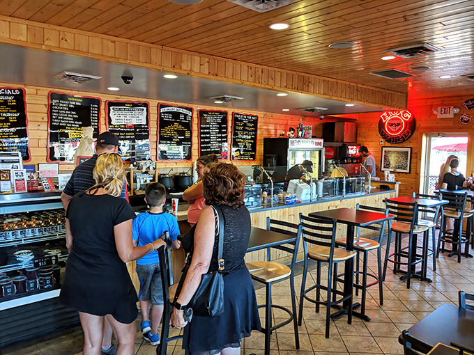 The pilgrimage to the counter—that moment of anticipation when you're about to commit to your barbecue destiny while others contemplate theirs.