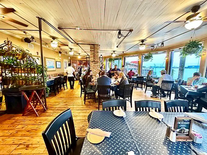 Happy diners enjoying the kind of meal that makes you want to move to the coast permanently.