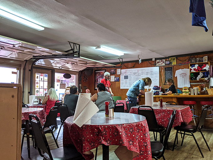 Red-checkered tablecloths set the stage for serious burger business, Houston-style, where casual means quality without the pretense.