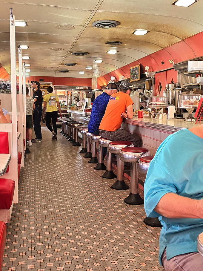 The counter buzzes with regulars perched on chrome stools&mdash;this isn't just breakfast, it's a daily community gathering that's been happening for decades.