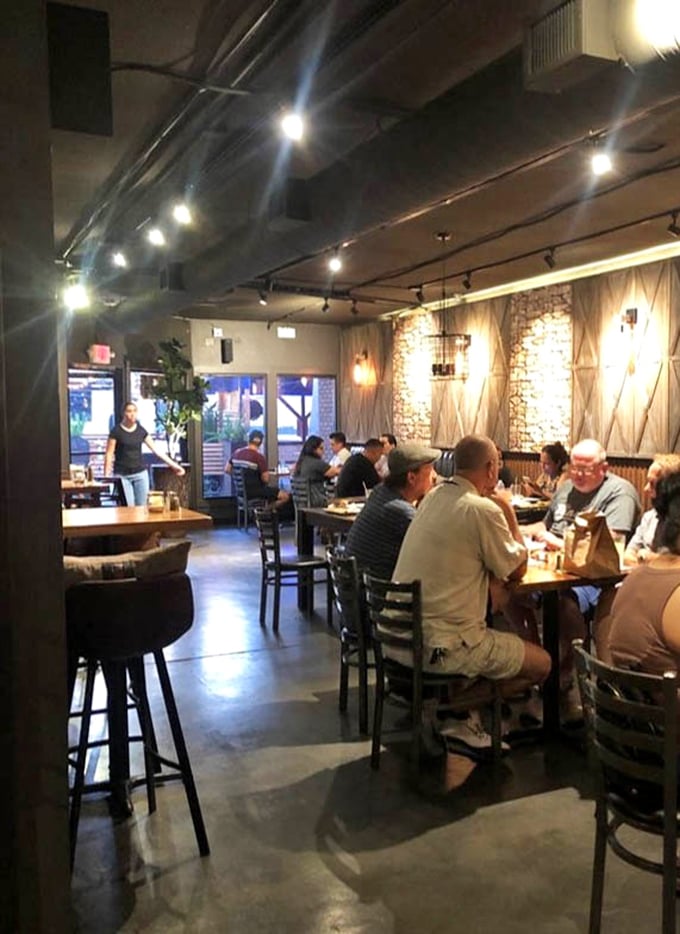 Where strangers become friends over shared appreciation of smoke rings and sauce-stained napkins.