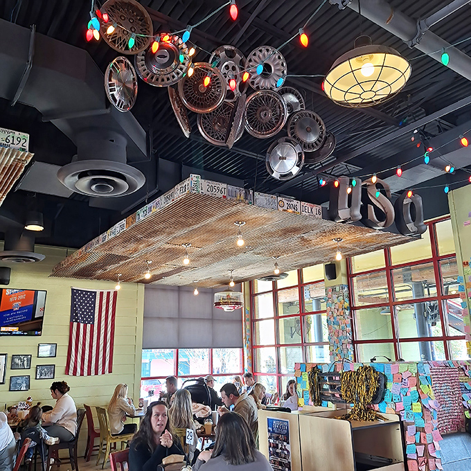 A ceiling of hubcaps, twinkle lights, and Americana charm make this diner feel like Route 66 in a room.