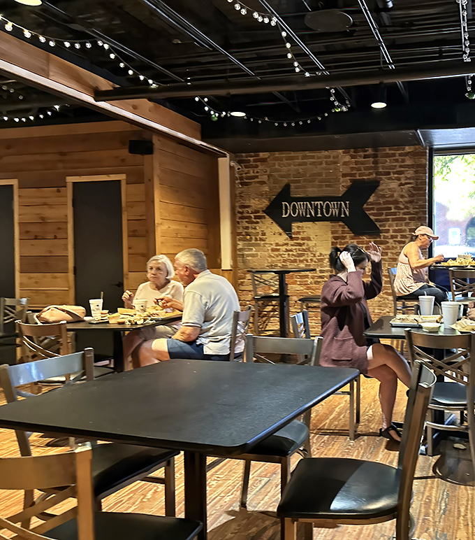 Generations gather around tables where the only politics discussed is whether sauce belongs on brisket. Spoiler: at The Oink Joint, you decide.