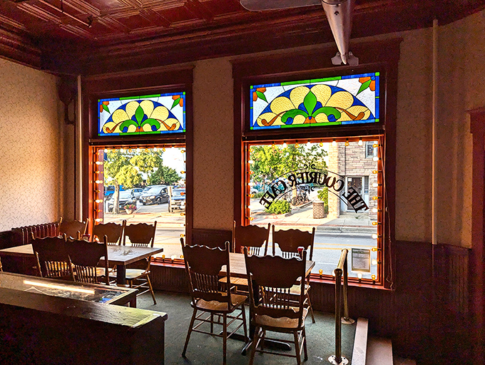 Those stained glass transoms filter the morning light like nature's Instagram filter, casting a glow that makes everyone look like they slept well.