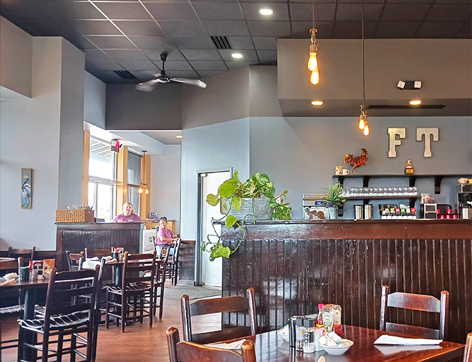 Plants, pendant lights, and comfortable seating create the breakfast trifecta. The "FT" initials stand for "Fantastically Tasty" in my book.