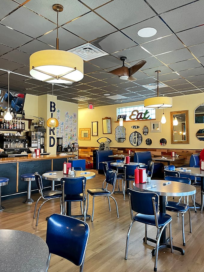 The warm yellow walls and blue chairs aren't just decor choices&mdash;they're mood enhancers that make everything taste even better.