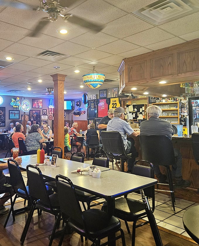 The dining area hums with the soundtrack of small-town life—clinking silverware, friendly greetings, and the occasional "How 'bout them Hawkeyes?"