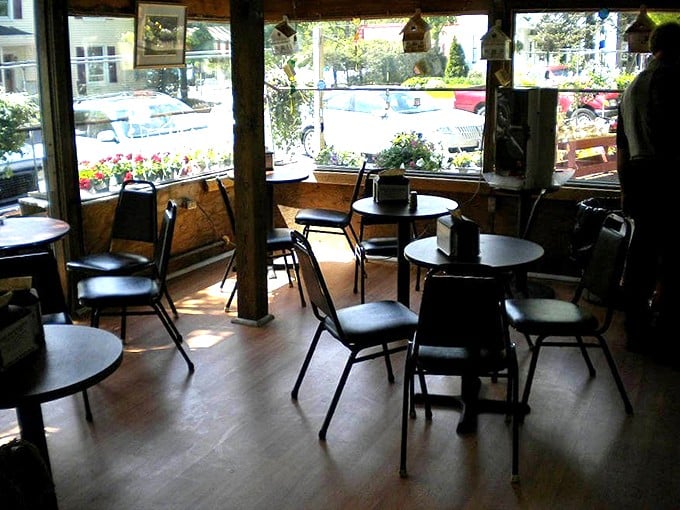 The dining area whispers, "Stay awhile," with the casual confidence of a place that knows its food speaks volumes. Simple tables that have heard countless "mmms" of approval.