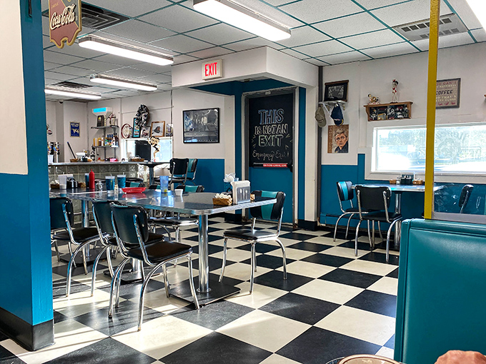 Classic black and white checkered floors that have supported generations of hungry Ohioans. The turquoise chairs aren't just seating &ndash; they're time machines to 1955.