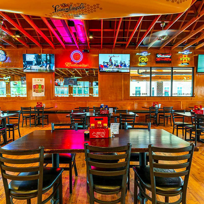 The warm wood tones and exposed ceiling create that perfect "fancy enough to be special, casual enough to relax" vibe every great BBQ joint needs.