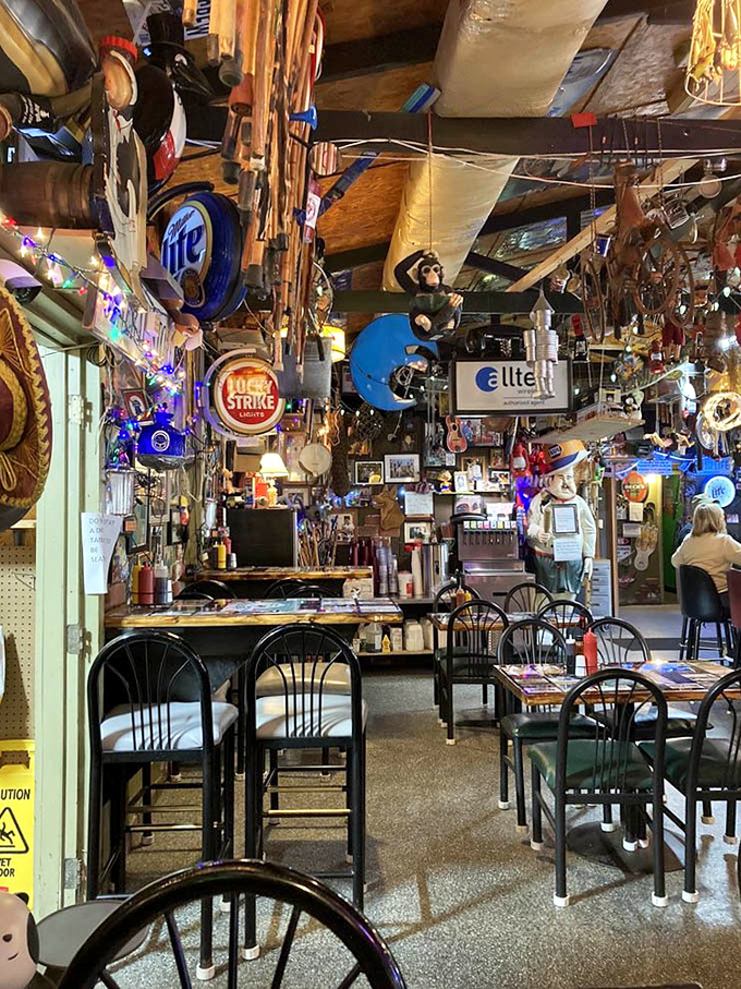 Dining under a canopy of curiosities&mdash;where fishing memorabilia and twinkling lights create the perfect backdrop for comfort food conversations.