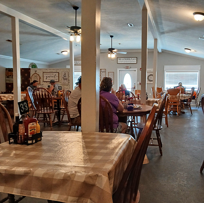Tables spaced for conversation, not eavesdropping. The kind of place where "How's your mama and them?" is a standard greeting.