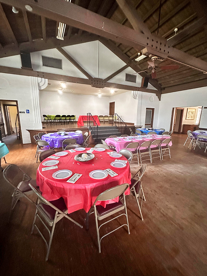 Exposed wooden beams and colorful tablecloths create a space where memories are made, one bite at a time.