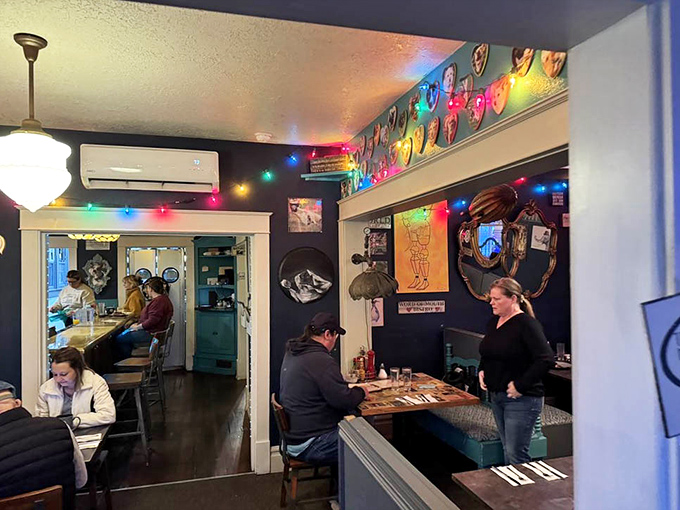 Colorful lights and whimsical decor create a morning atmosphere that's part diner, part art gallery, and entirely welcoming.