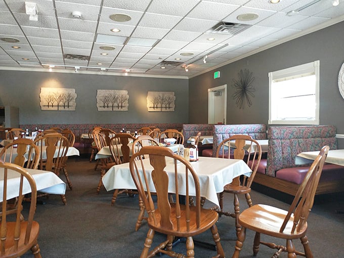 Another dining area view showcases the supper club's understated charm&mdash;where conversations flow as freely as the cocktails.