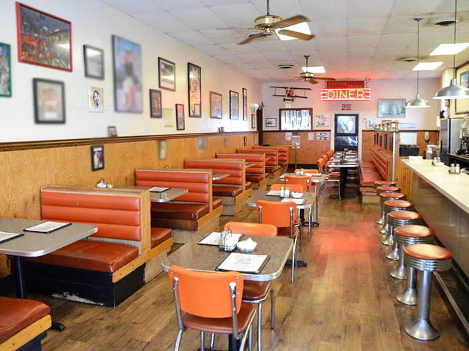 Counter seating: where strangers become neighbors and regulars become family. Democracy in action, one coffee refill at a time.