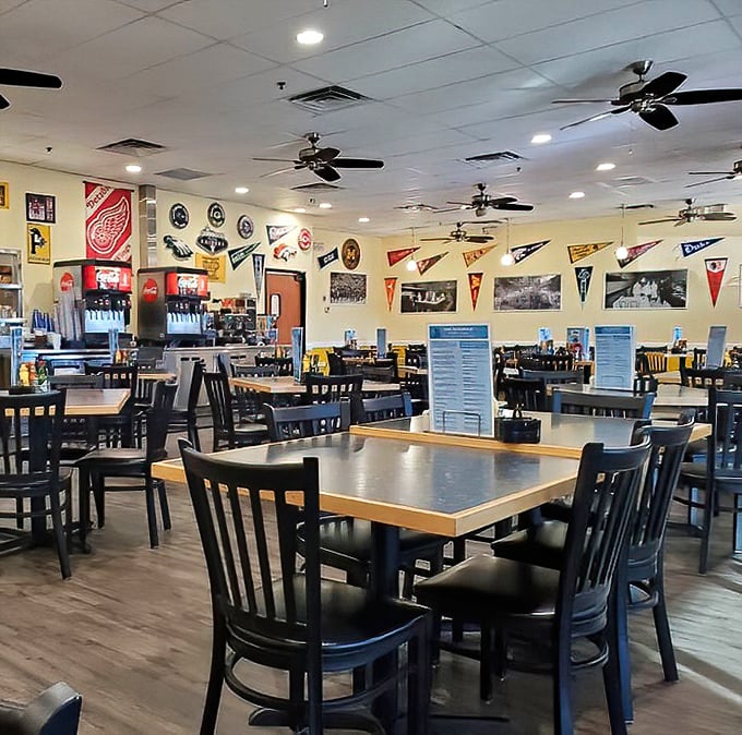Sports pennants create a collegiate atmosphere where the only required course is Breakfast 101. The wooden floors have seen many happy food dances.