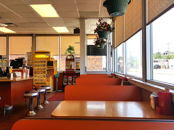 More orange seating and that classic diner layout that hasn't changed because when something works this well, why mess with it?
