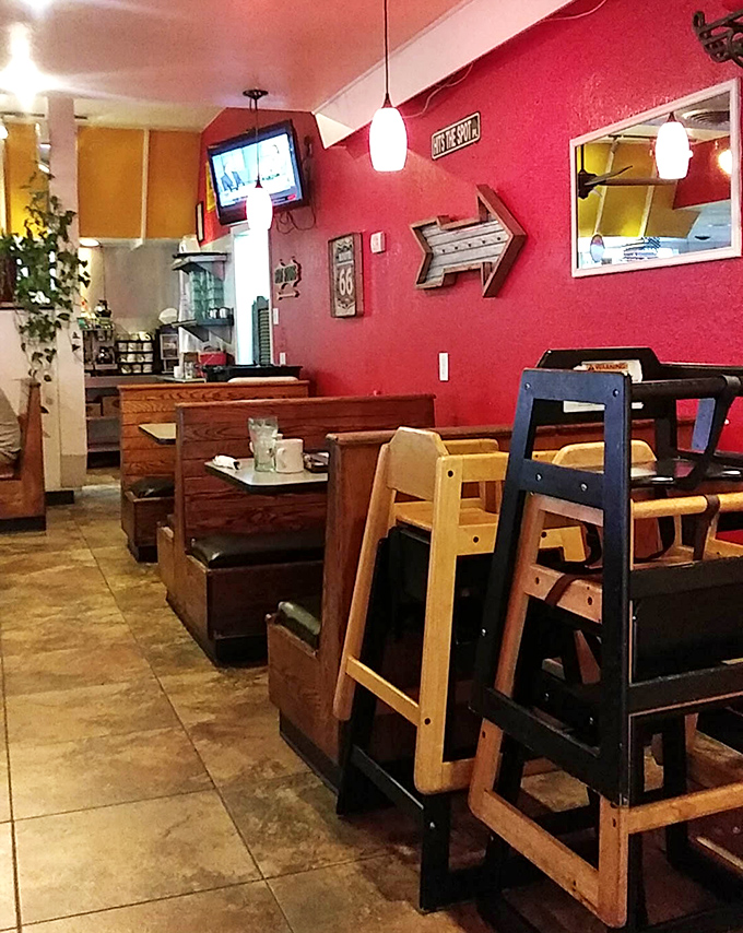 Those red walls aren't just for show&mdash;they're warning signs that the food here is serious business. High-chairs standing by for the next generation.