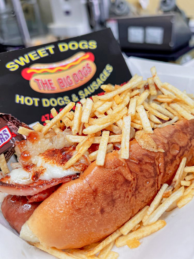 The Dolphins Dog comes loaded with toppings and fries&mdash;a meal that requires both hands and possibly a game plan.