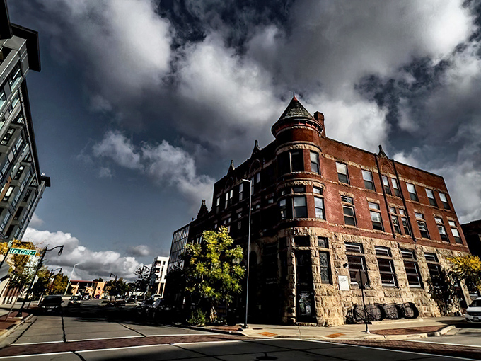 This historic corner building with its dramatic turret has witnessed Eau Claire's evolution from lumber boomtown to cultural hotspot, standing proud against dramatic skies.