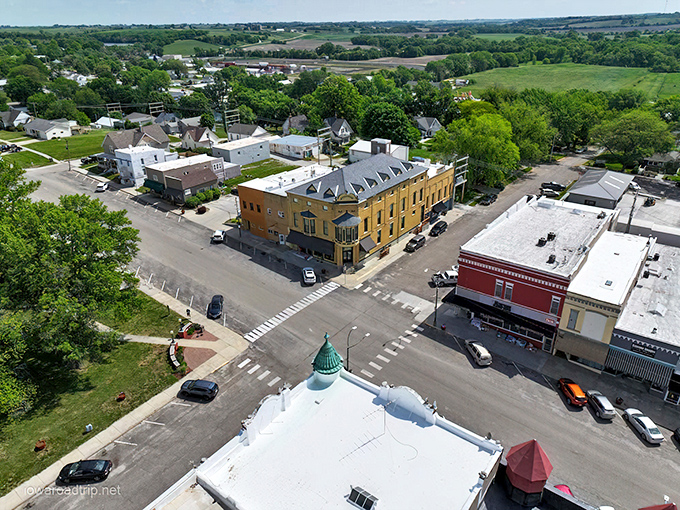 From above, Corning reveals itself as a perfect grid of tree-lined streets embraced by the undulating green quilt of Iowa farmland.