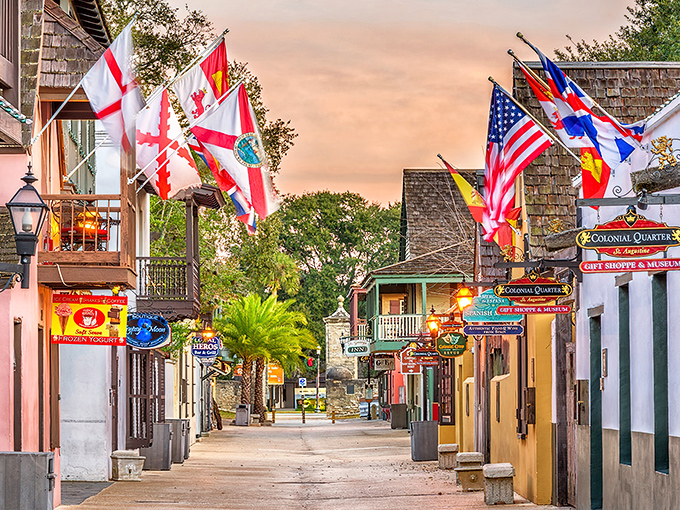 St. George Street at dusk transforms into a magical corridor where flags from five centuries flutter, telling tales of conquest, commerce, and courage.
