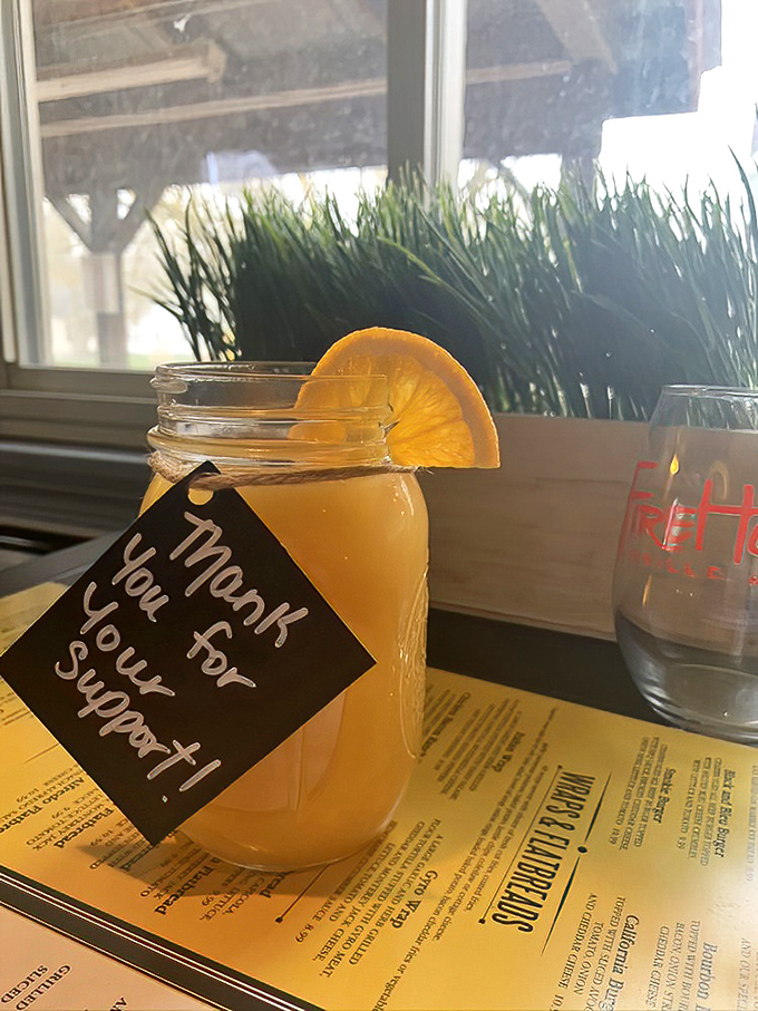 That mason jar isn't just holding a refreshing beverage&mdash;it's holding liquid sunshine with a thank-you note, because good drinks deserve good manners.