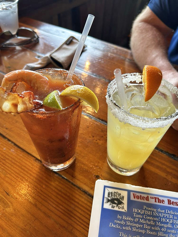 Proper vacation cocktails: colorful, strong enough to make you forget your inbox, and garnished with fruit that counts as a serving of vitamins.