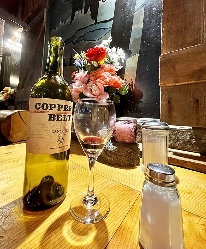A bottle of local red, a proper wine glass, and rustic surroundings. Sometimes the simplest pleasures are the most profound, especially after a long day exploring Eastern Oregon.